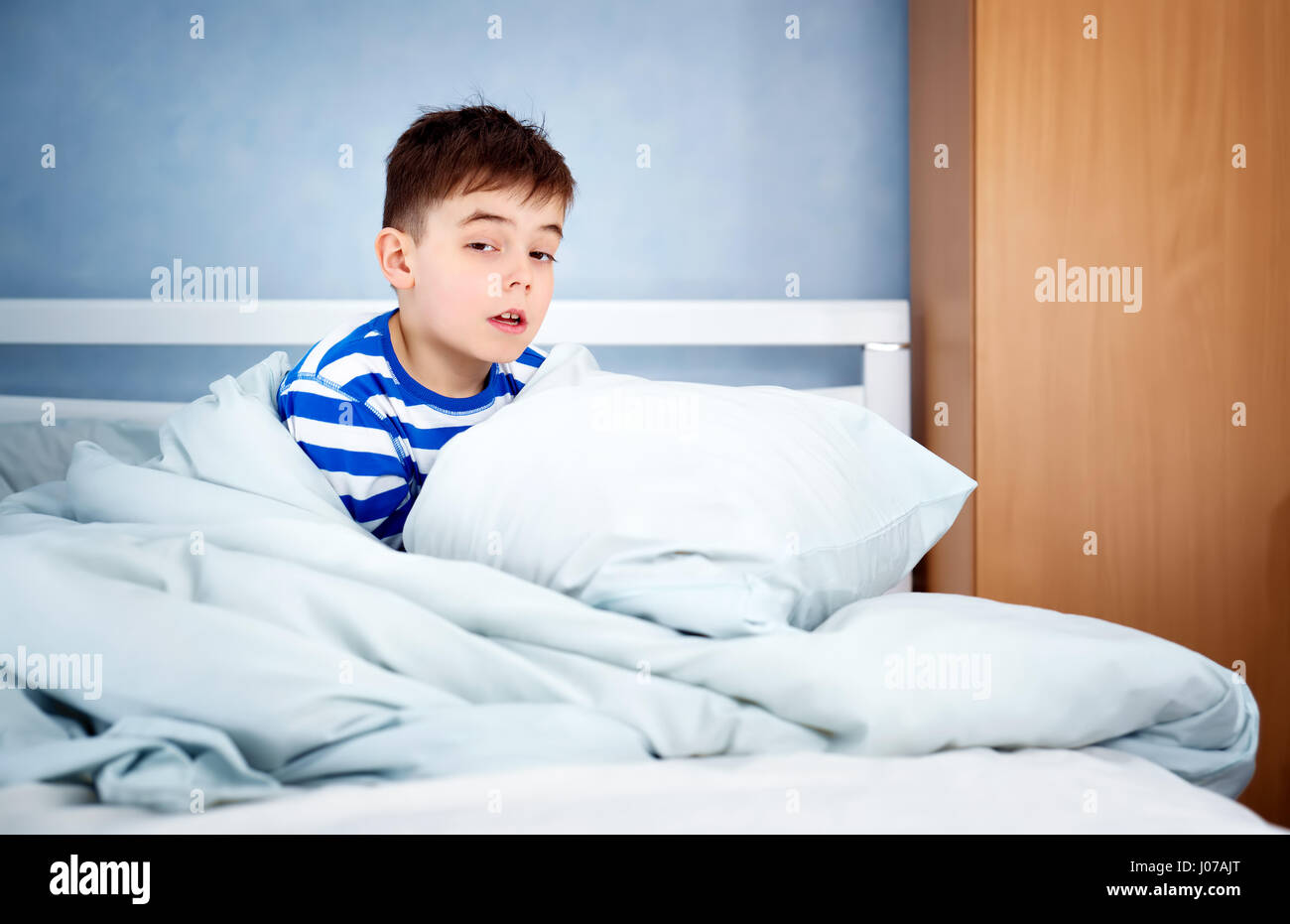 Scared boy bed hi-res stock photography and images - Alamy