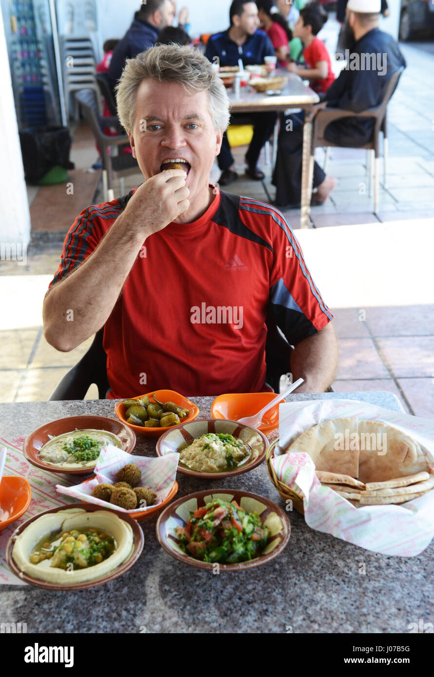 Traditional Jordanian breakfast- Hummus, Falafel and Pita bread served ...