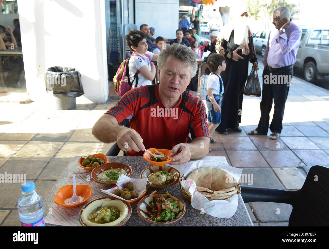 Traditional Jordanian breakfast- Hummus, Falafel and Pita bread served ...