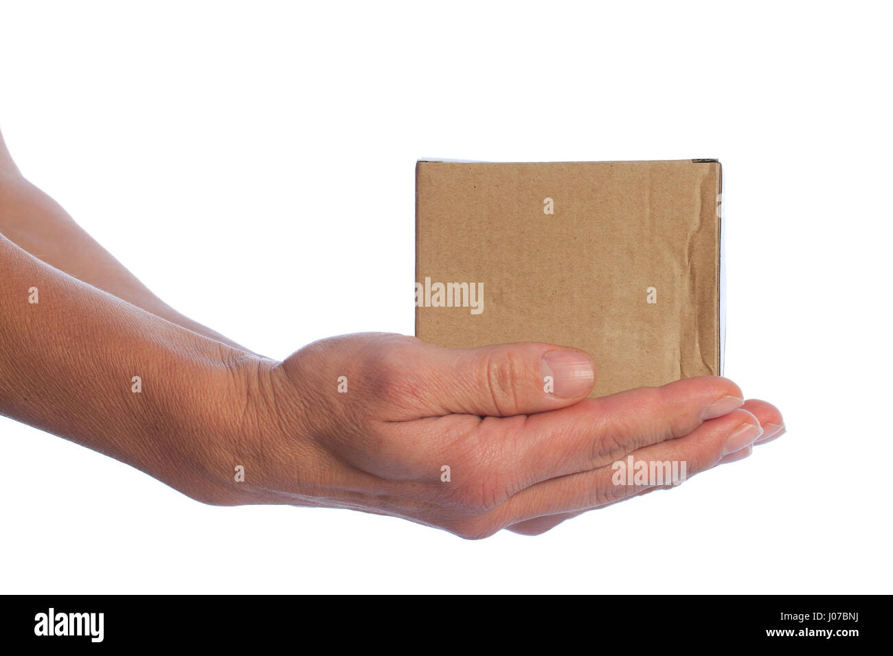 Cardboard box in hands isolated on white Stock Photo - Alamy