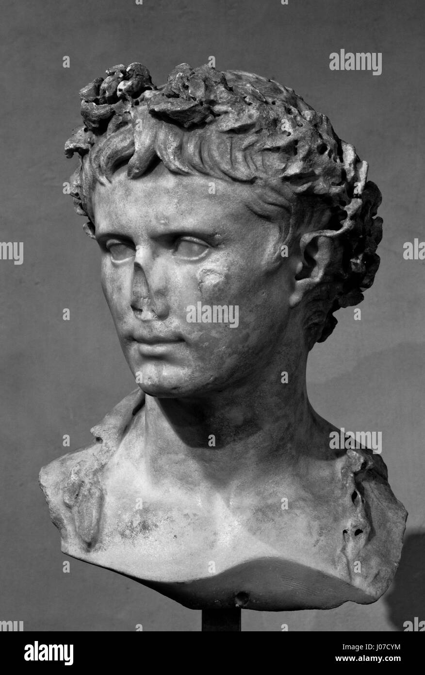 The 'Tête d'Auguste' is a black-and-white image of a sculpture ...