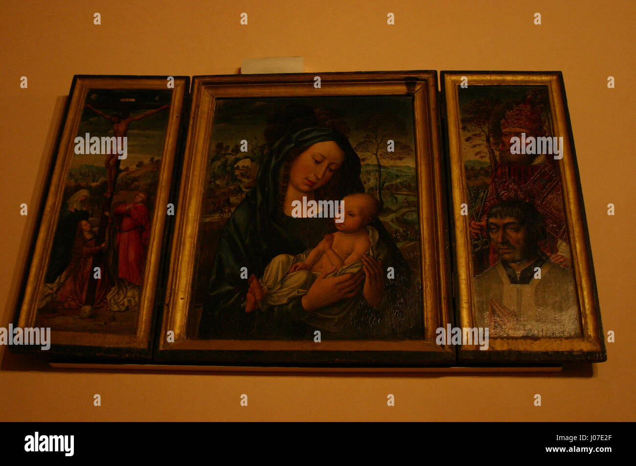 This 16th-century triptych, attributed to the Master of the Legend of Magdalene, depicts the ...