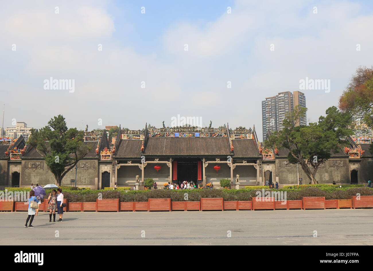 People visit Chen Clan Academy in Guangzhou China. Chen Clan Academy is an academic temple built ...