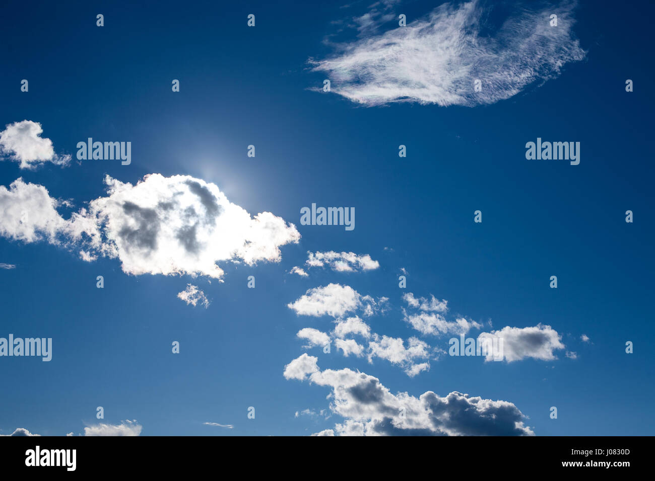 Bright clear sky with white clouds. Summer sunny day Stock Photo - Alamy