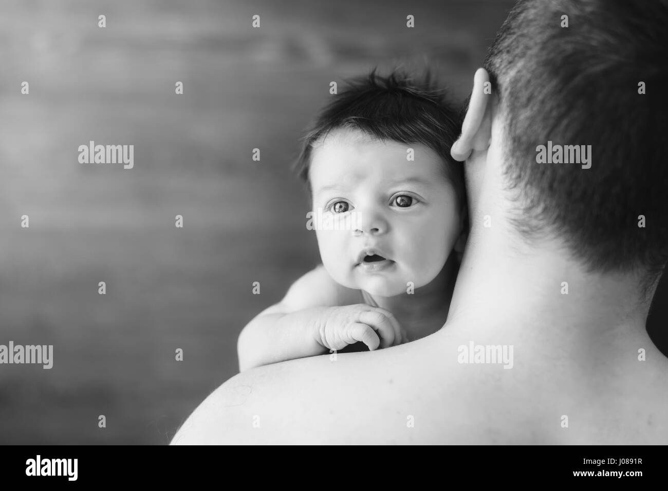 Father hand son shoulder Black and White Stock Photos & Images - Alamy