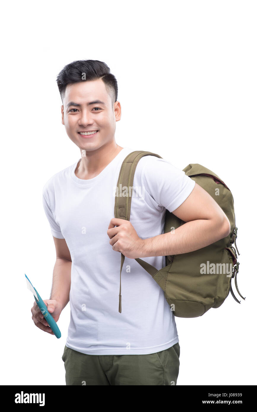 Travel concept. Studio portrait of handsome young man with backpack ...