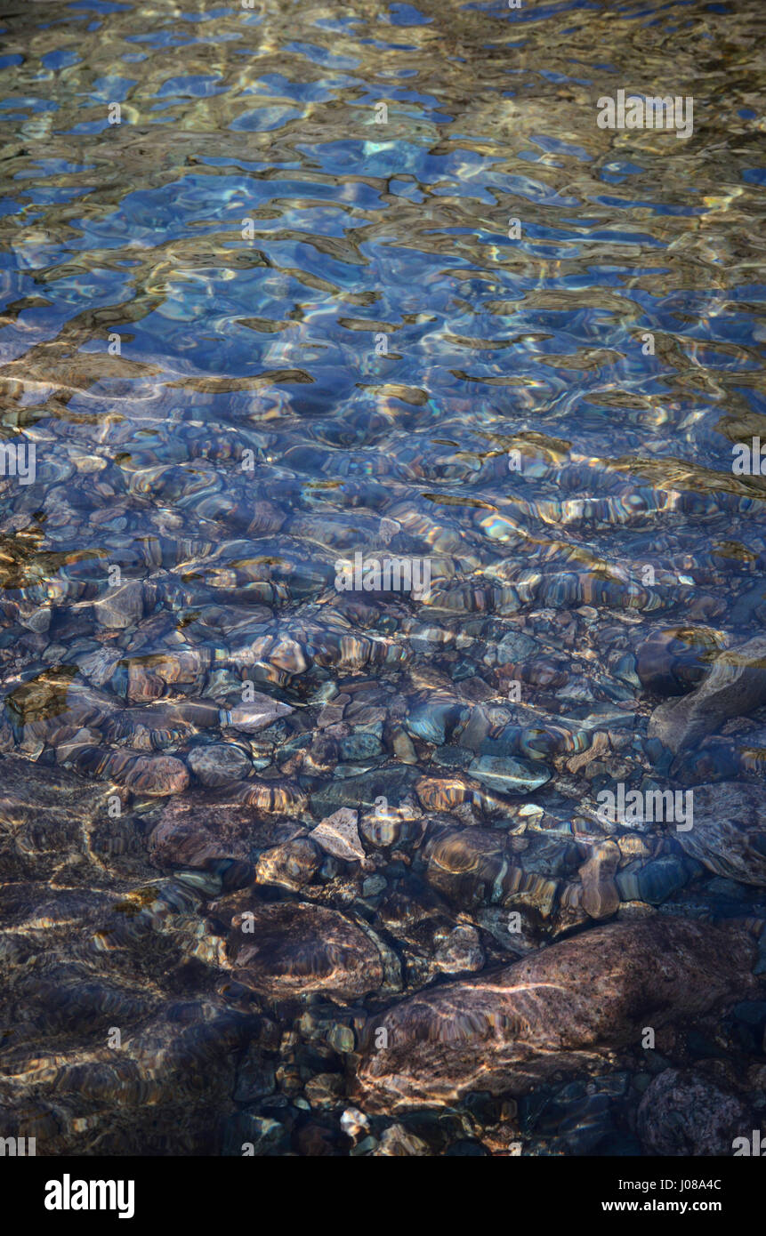 Flowing through stones hi-res stock photography and images - Alamy