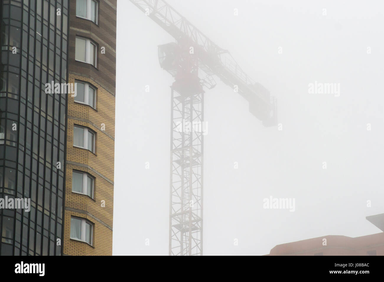 Construction site in foggy weather hi-res stock photography and images ...
