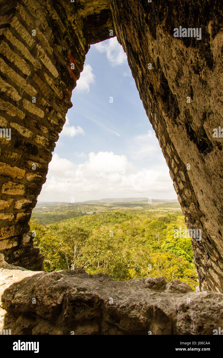 View out of an arch window in El Castillo a site in Xunantunich Mayan ...