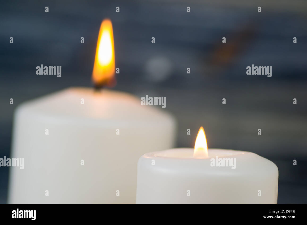 a candle is lit in the darkness and gives spiritual warmth Stock Photo ...