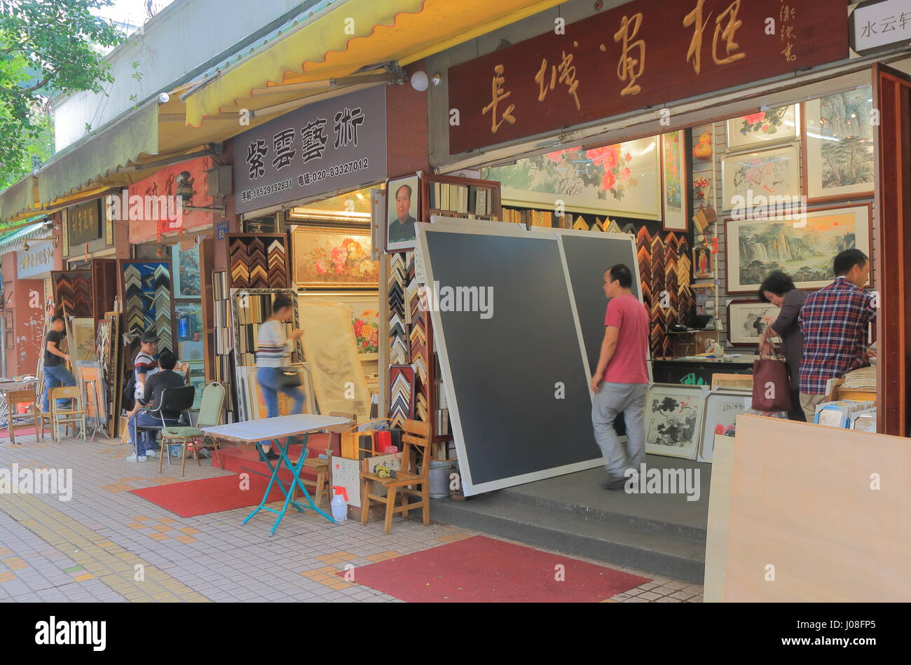 People visit art shops on Cultural street in Guangzhou China. Cultural ...