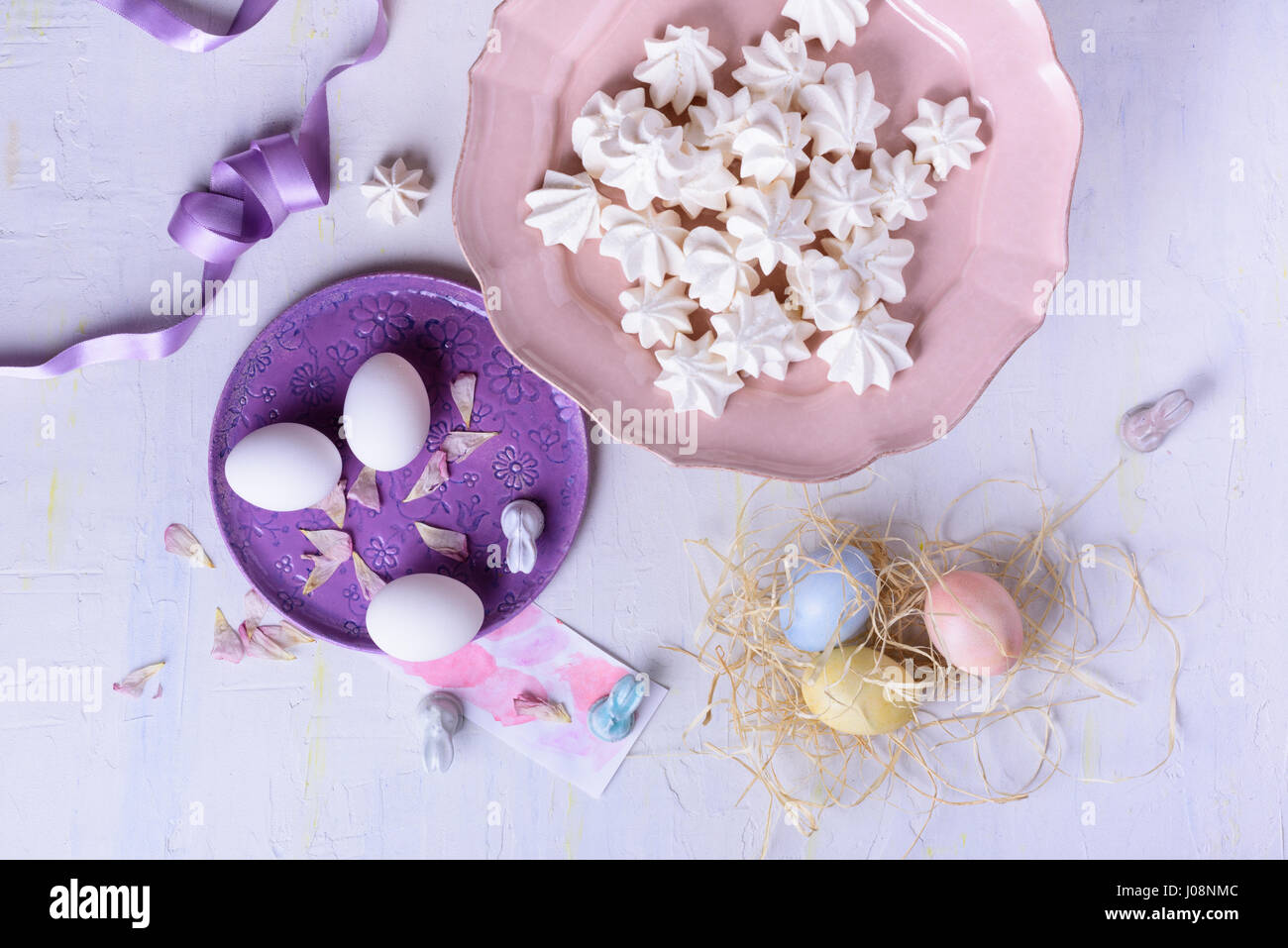 Easter colored eggs, chicken egg, sweet dessert. Pastel colors holiday ...