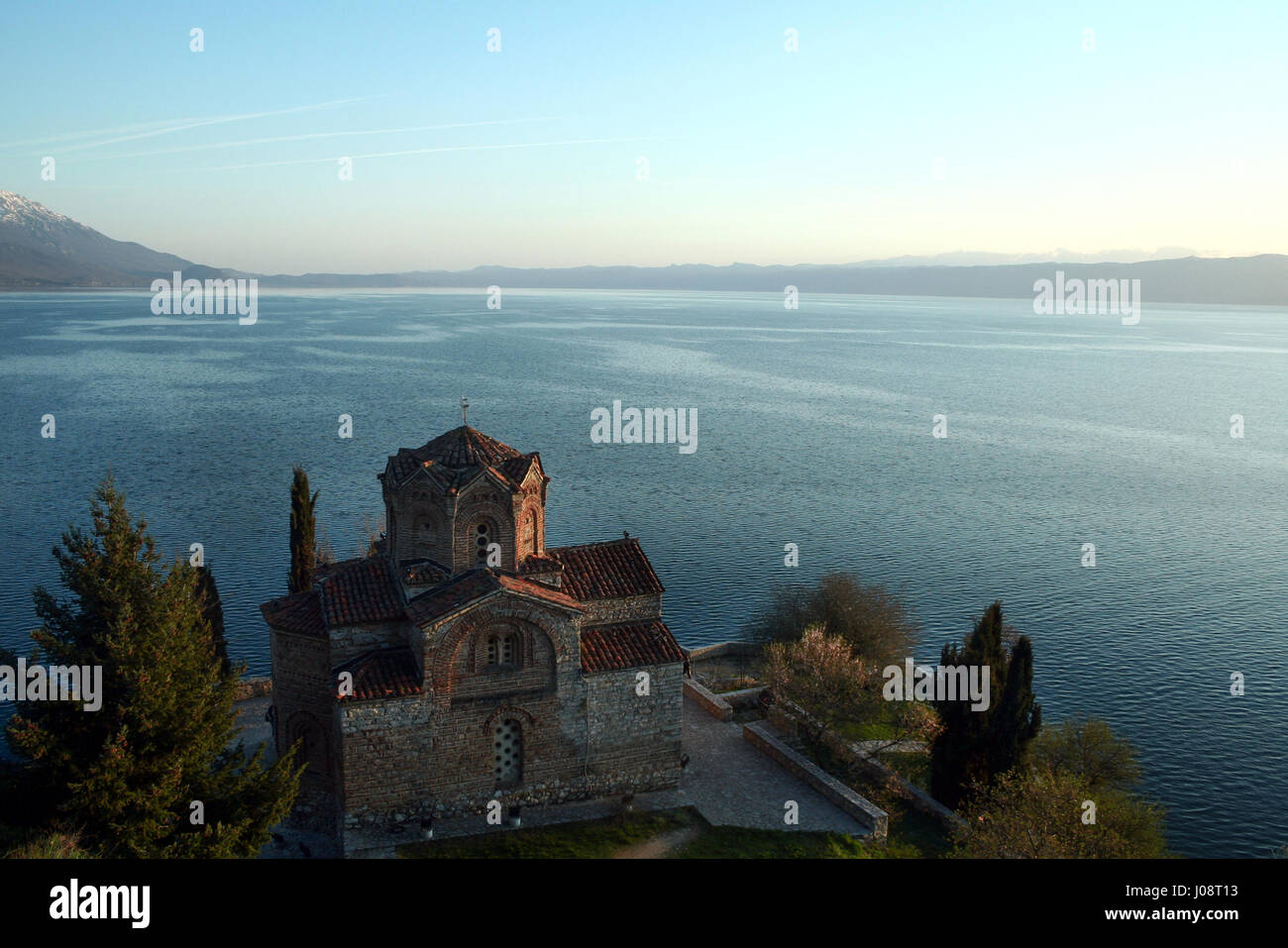 Saint Naum monastery at sunset over Ohrid lake, in the southern part of ...