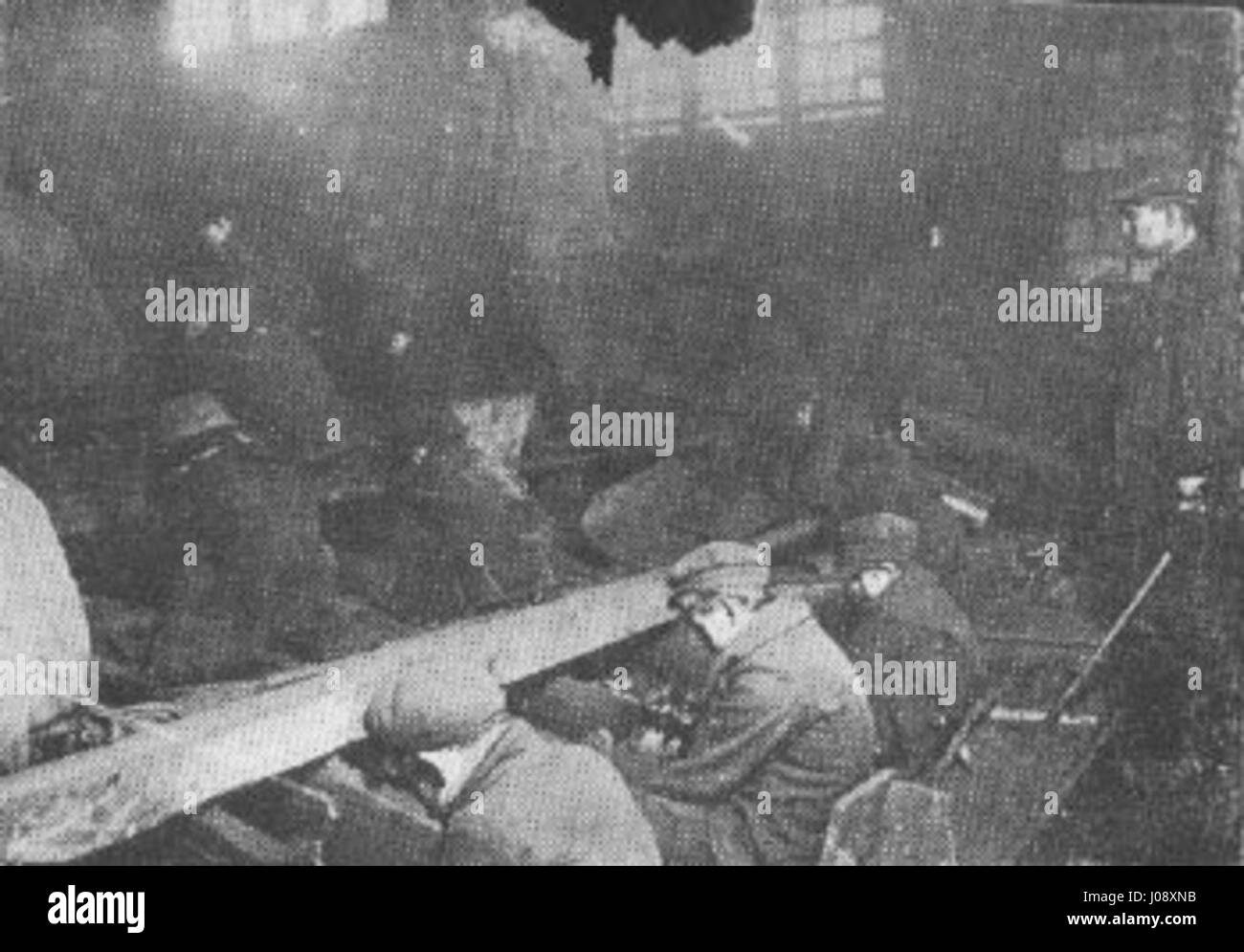 This photograph depicts young boys working in a coal mine during the ...