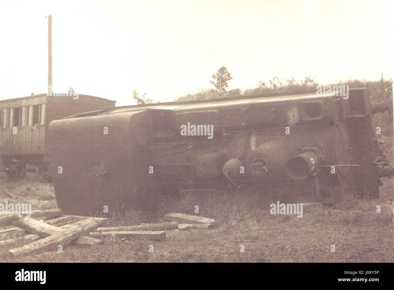 The painting *Umgestürzte Lok* (Derailed Locomotive) depicts a dramatic ...