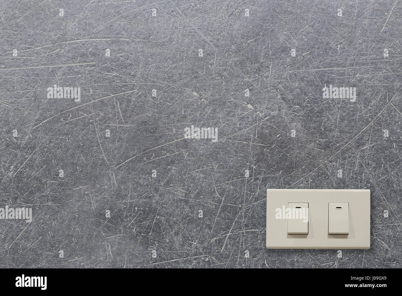 White electric switch on stone wall and have copy space to input your ...