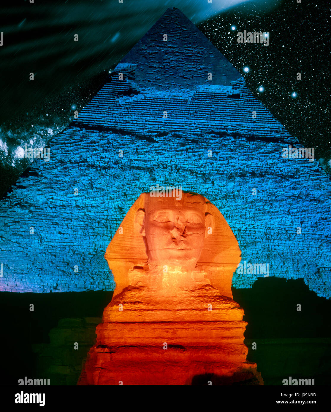 Spinx and Pyramid illuminated at night, Giza, Cairo, Egypt Stock Photo ...