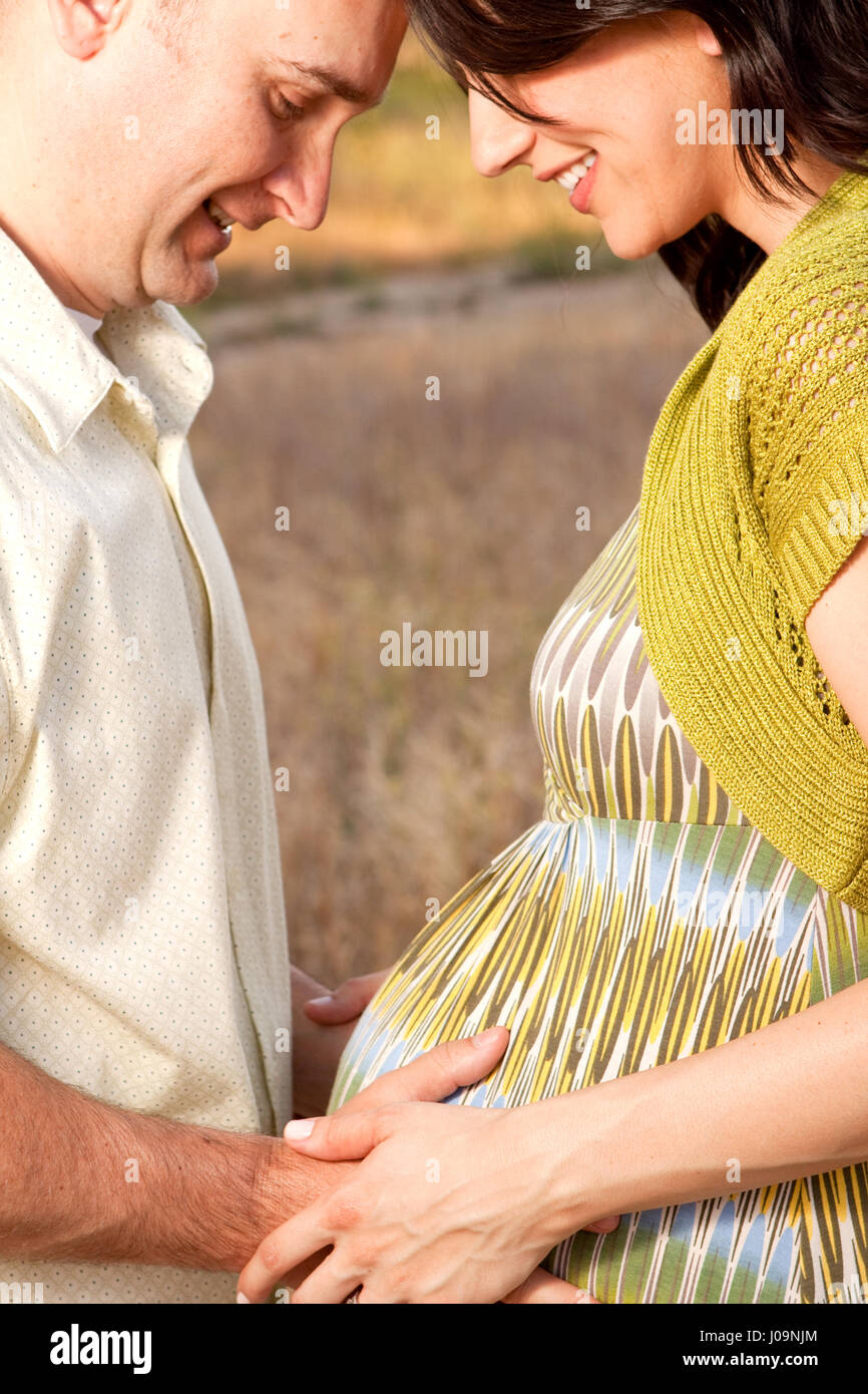 Beautiful young couple expecting a baby Stock Photo - Alamy