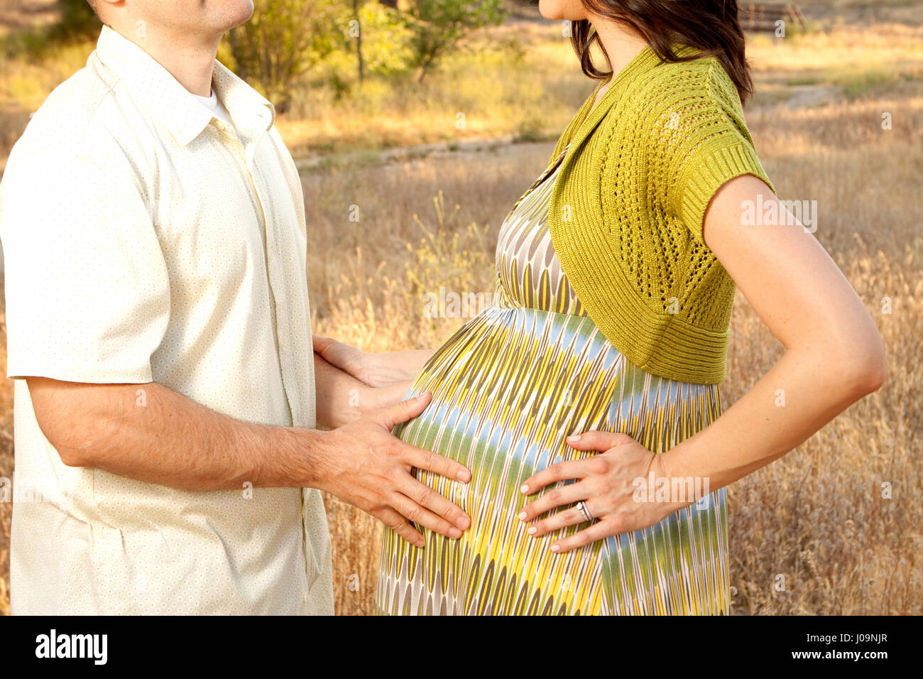 Beautiful young couple expecting a baby Stock Photo - Alamy
