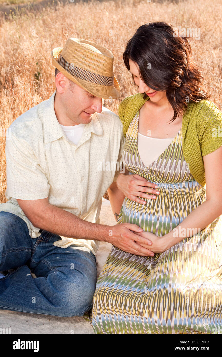 Beautiful young couple expecting a baby Stock Photo - Alamy