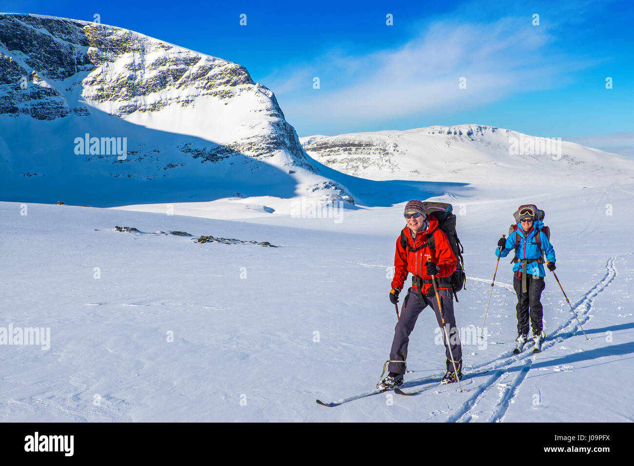 Ski-tourers skiing the Troms Border Trail, a long distance route in ...