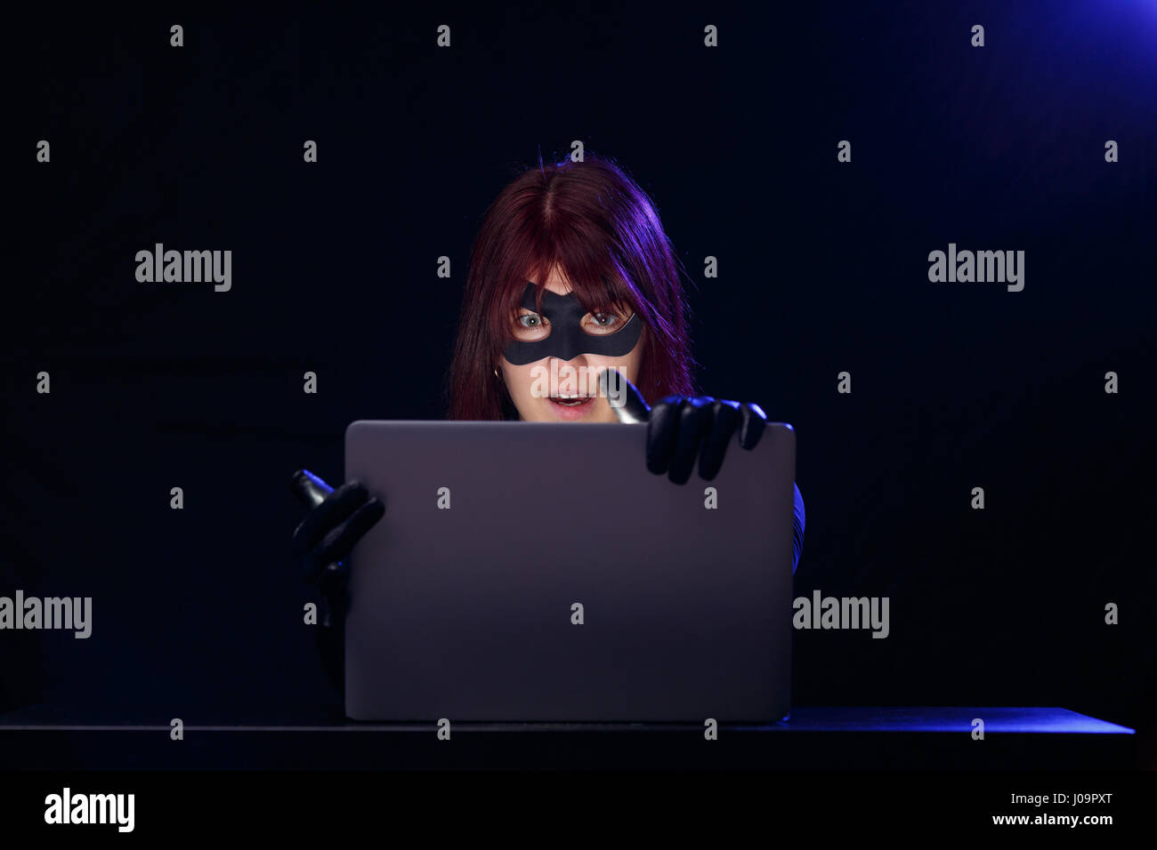 Night photo of female hacker Stock Photo - Alamy