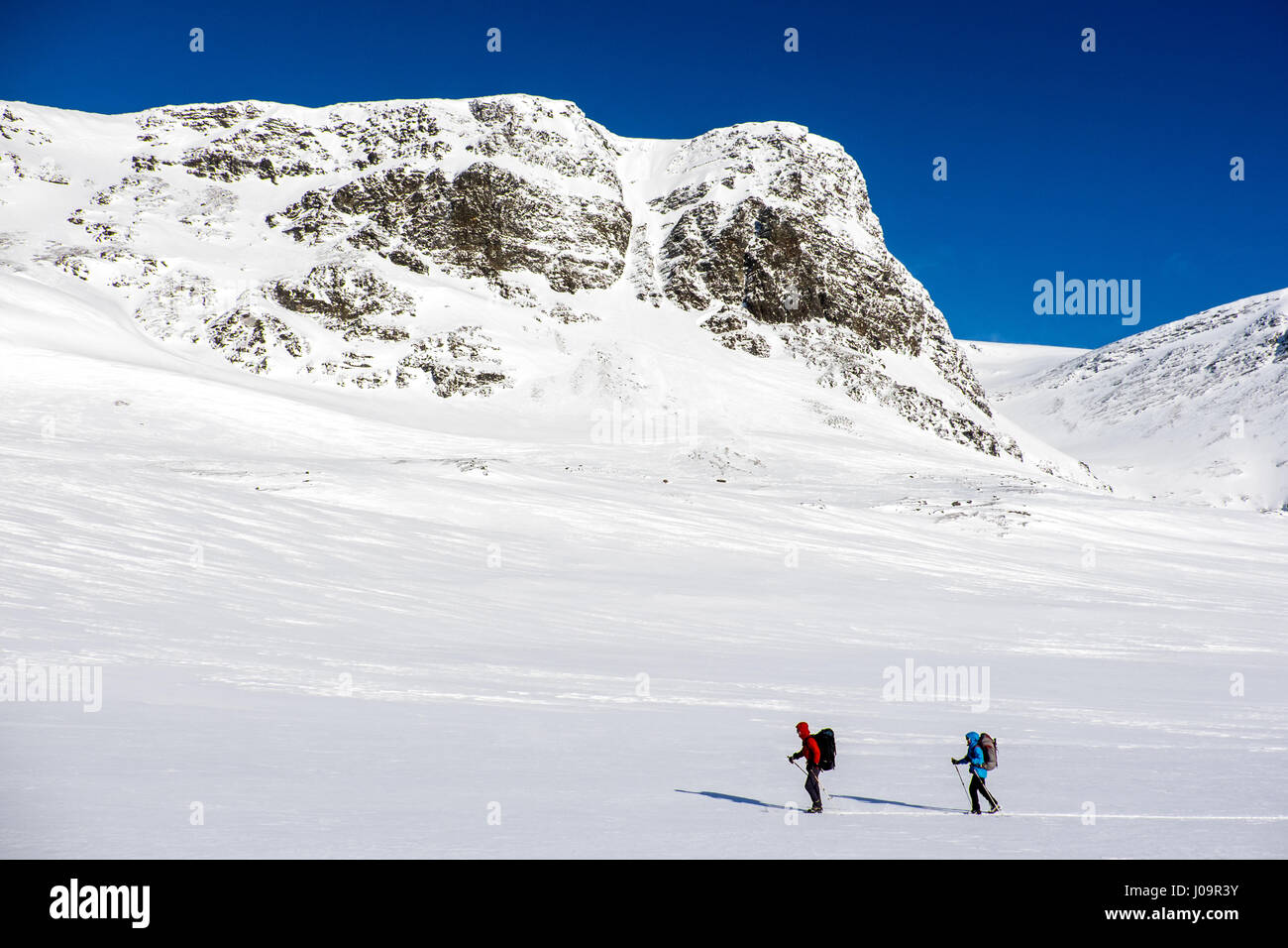 Ski-tourers skiing the Troms Border Trail, a long distance route in ...