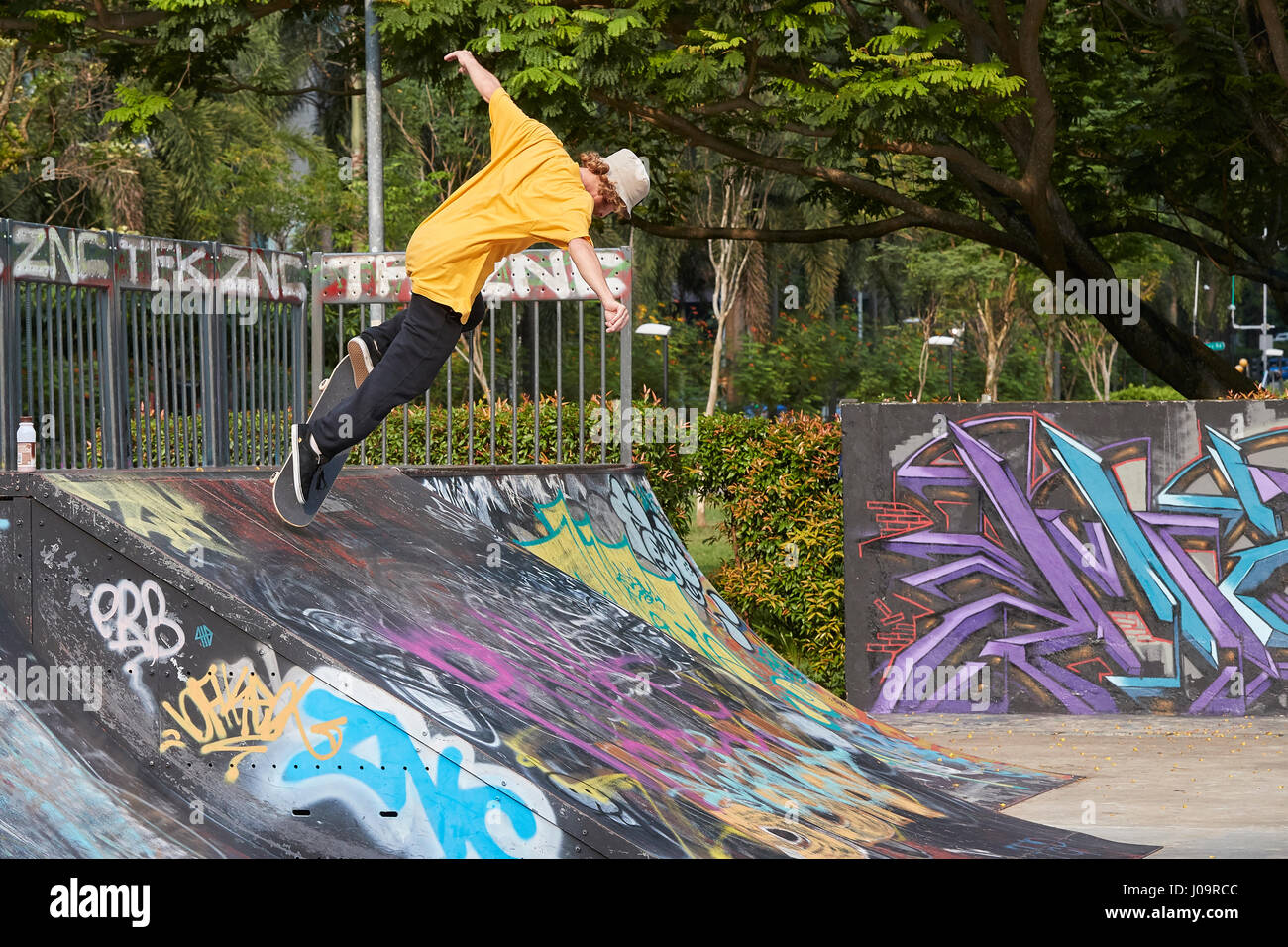 Young Man Skateboarding In The SCAPE Skate Park, Singapore Stock Photo ...