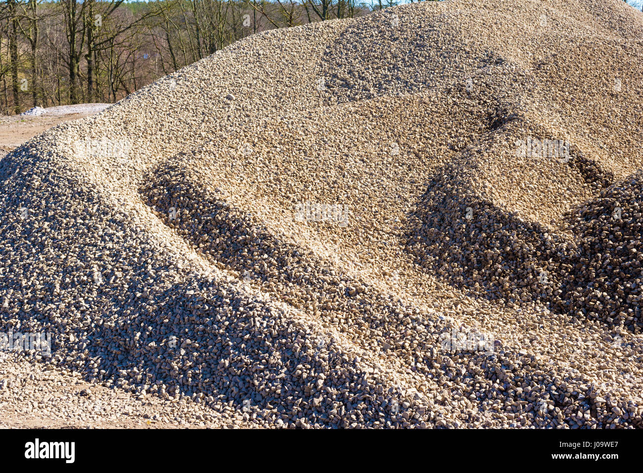 Pile of granite stone pebbles at construction site Stock Photo - Alamy
