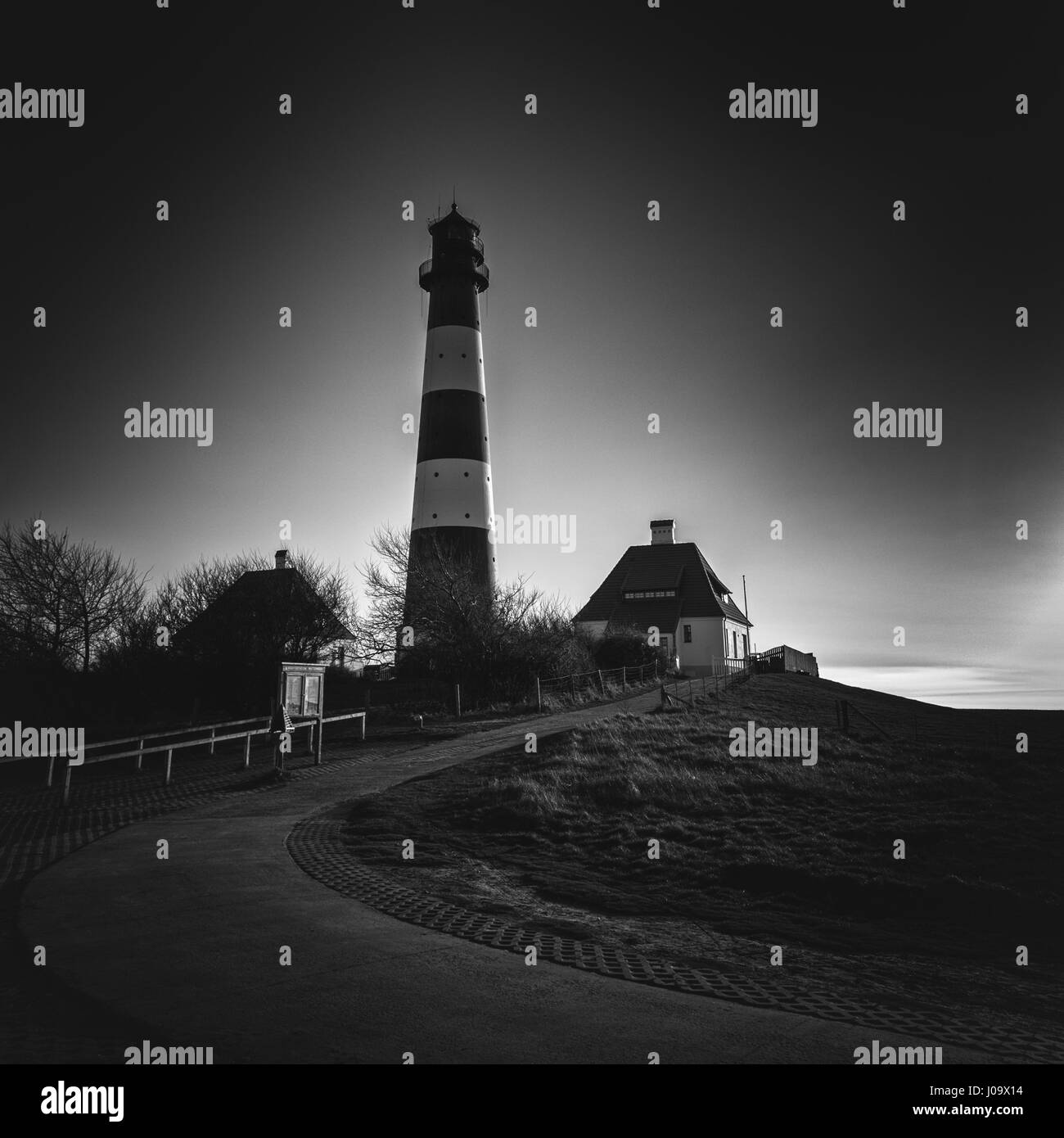 Germany´s most famous lighthouse Westerheversand in the salt marshes ...