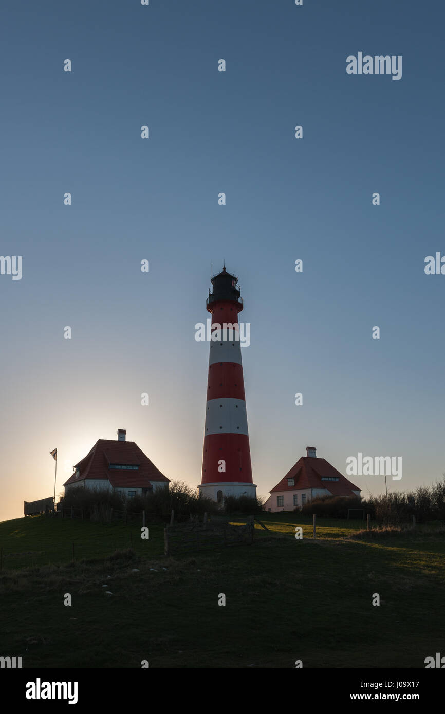 Germany´s most famous lighthouse Westerheversand in the salt marshes ...