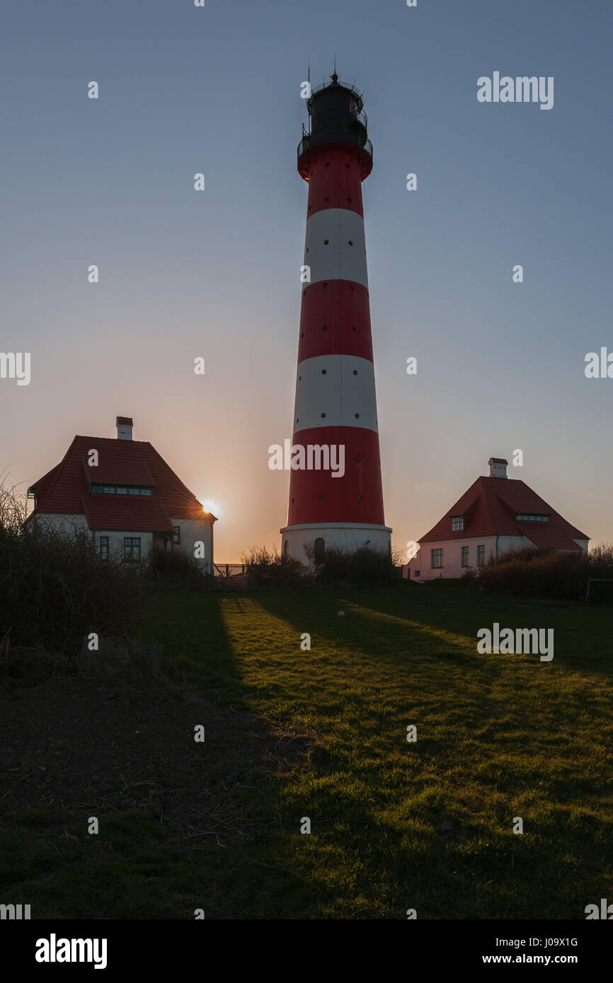 Germany´s most famous lighthouse Westerheversand in the salt marshes ...