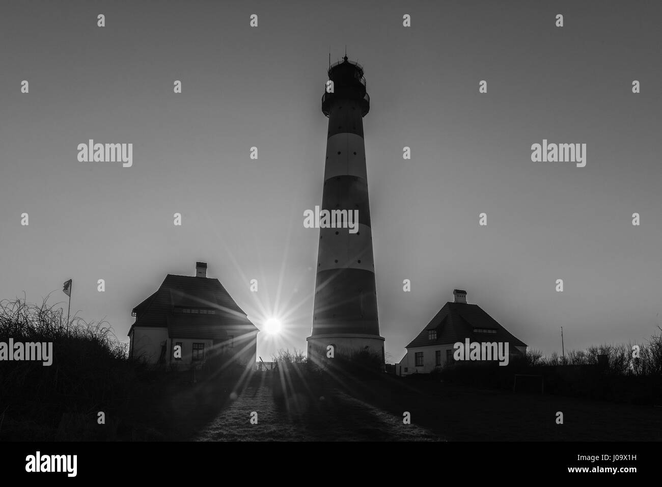 Germany´s most famous lighthouse Westerheversand in the salt marshes ...