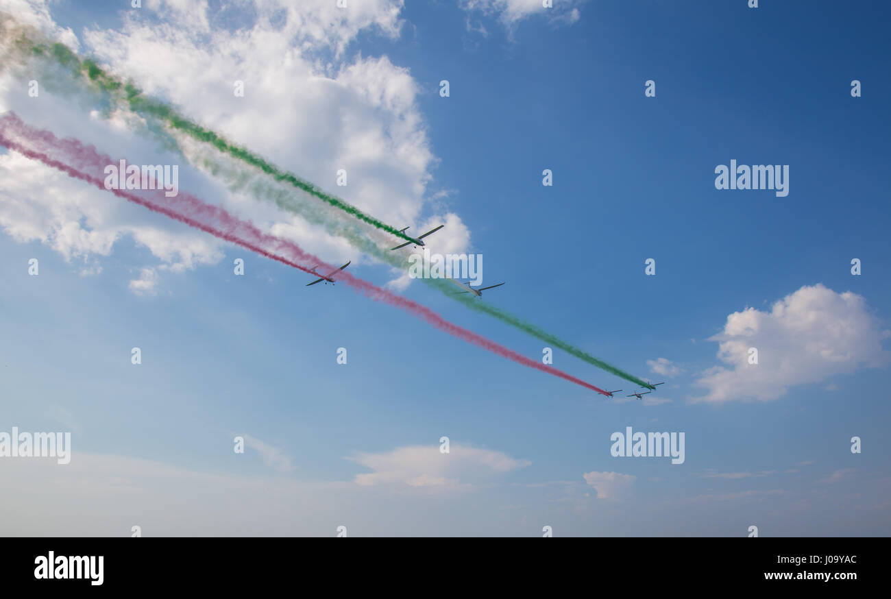 Performance ultralight aircraft with colored smoke Stock Photo - Alamy