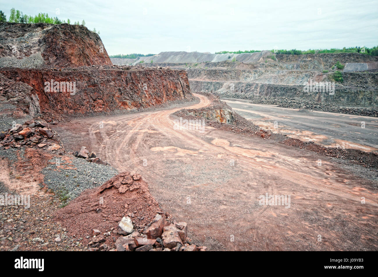 view into surface mine of porphyry rocks Stock Photo - Alamy