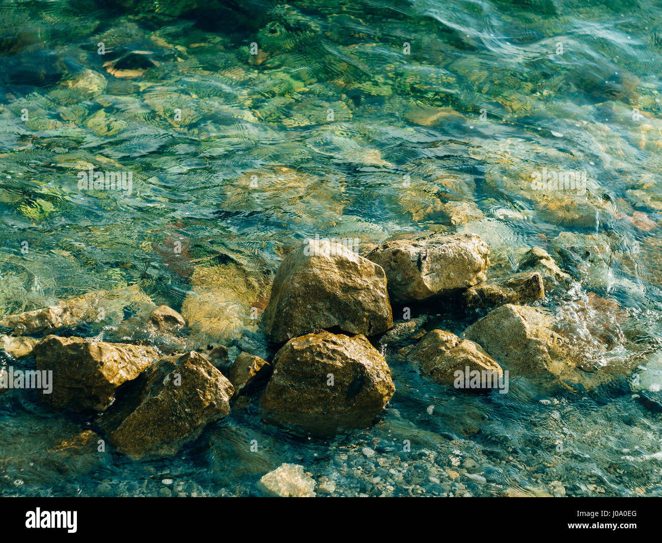 Azure sea water in Montenegro Stock Photo - Alamy