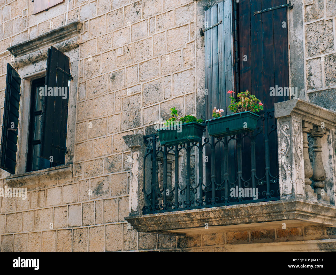 Forged balcony in an old house Stock Photo - Alamy