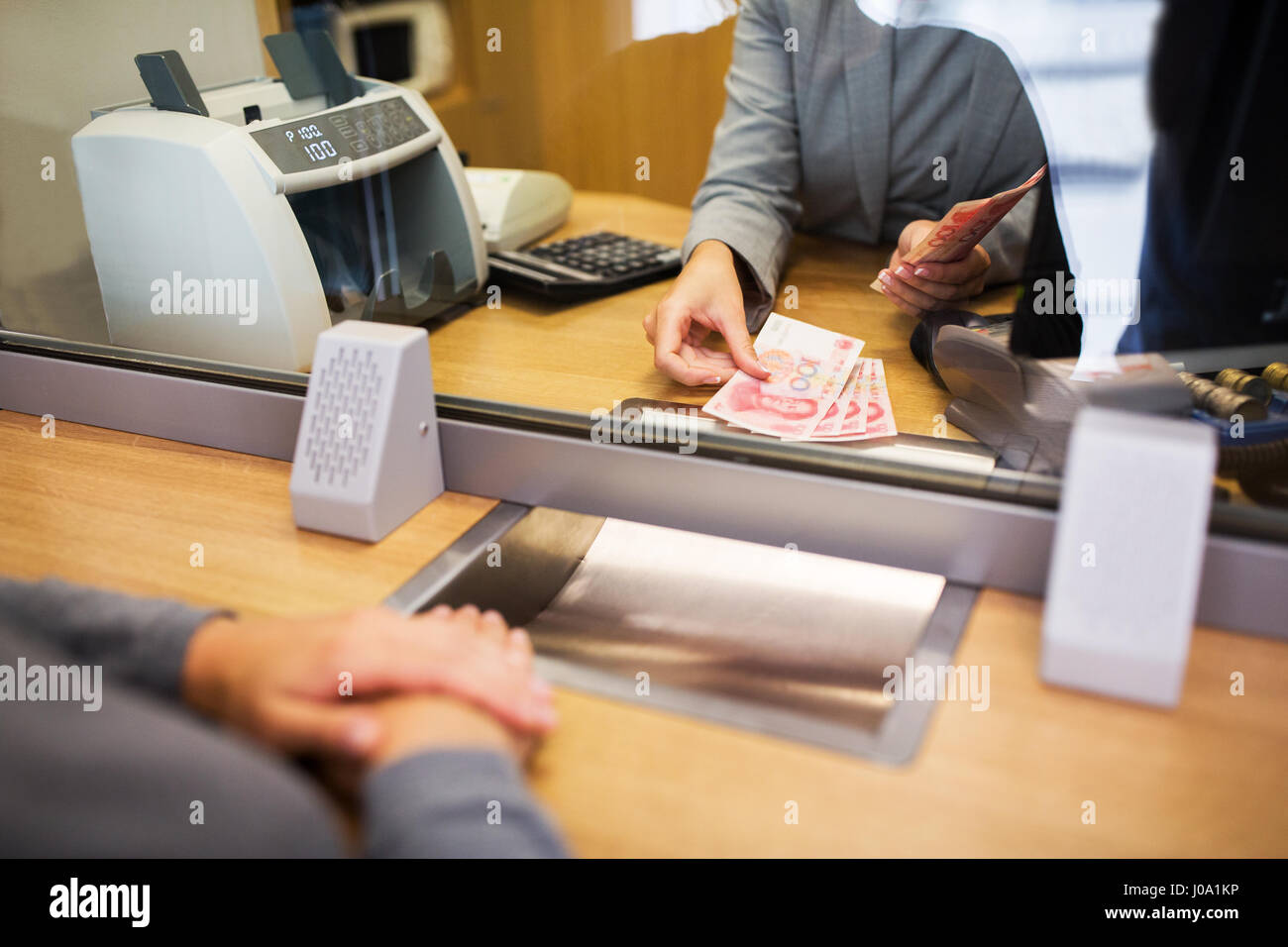 clerk counting cash money at bank office Stock Photo - Alamy