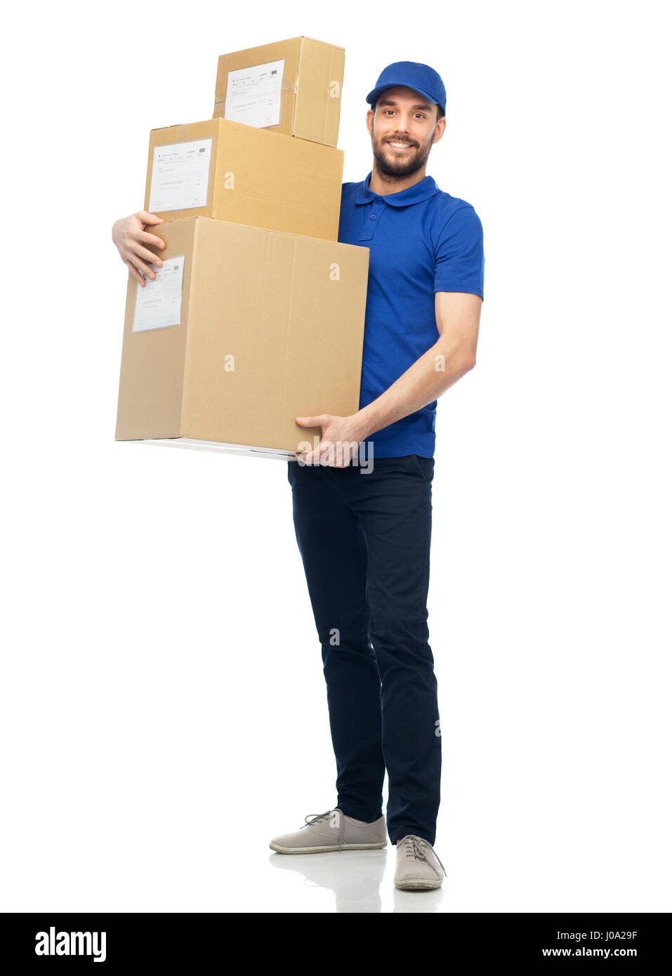 happy delivery man with parcel boxes Stock Photo - Alamy
