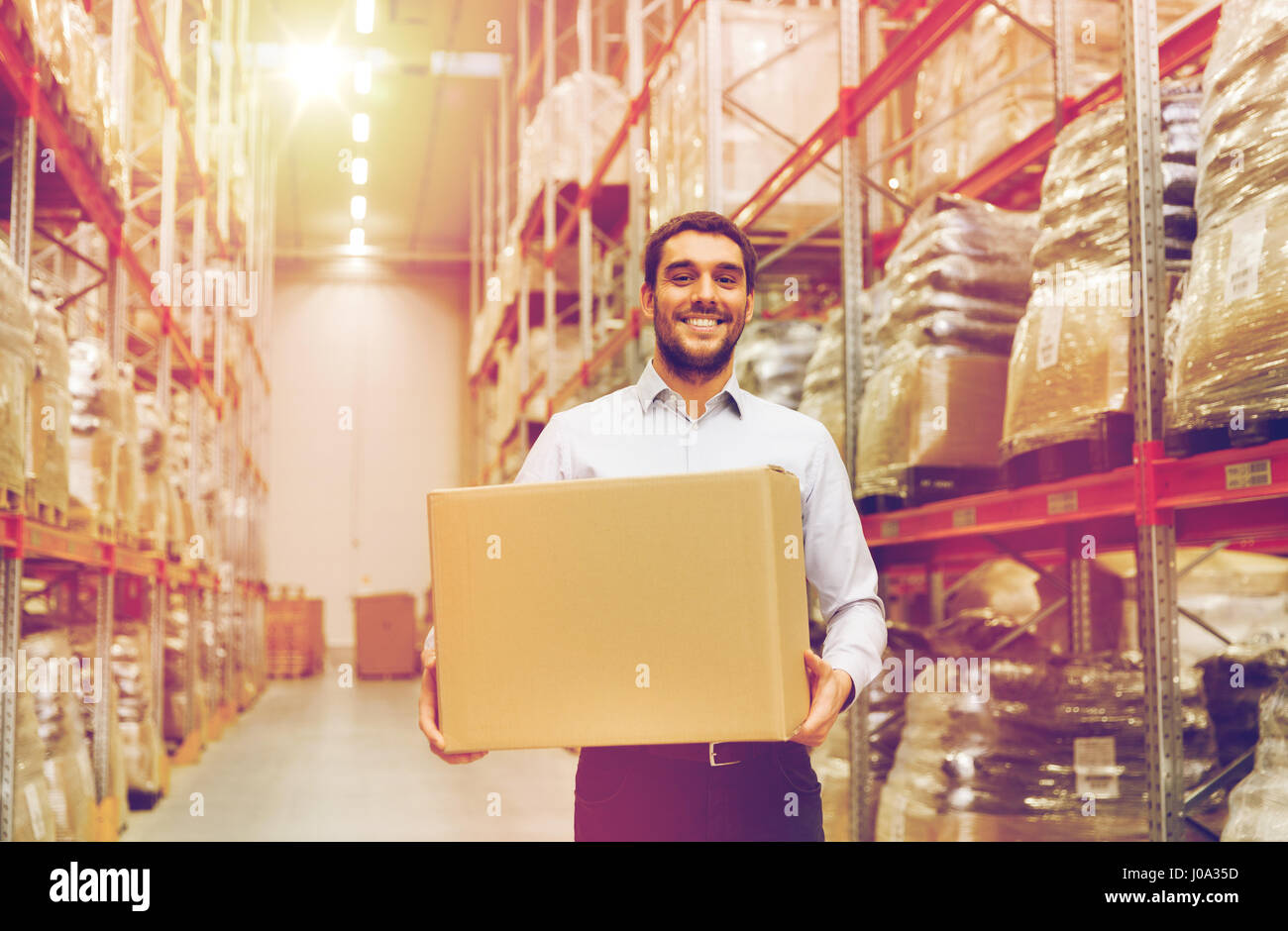 Smiling businessman cardboard box hi-res stock photography and images ...
