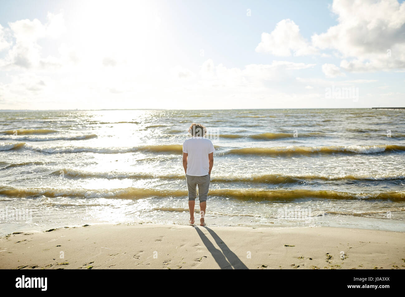 Happy man beach hi-res stock photography and images - Alamy