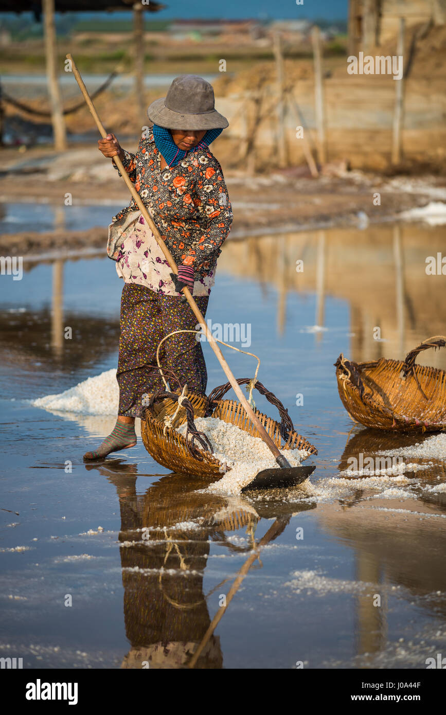 Local people working in the salt fields of Kampot, Cambodia, Asia Stock ...