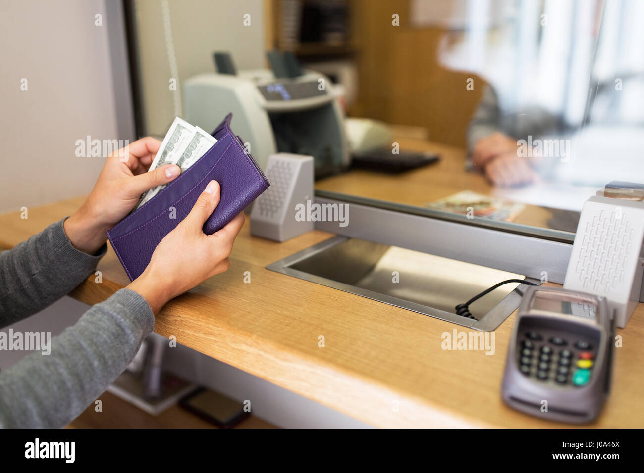 hands with money at bank or currency exchanger Stock Photo - Alamy
