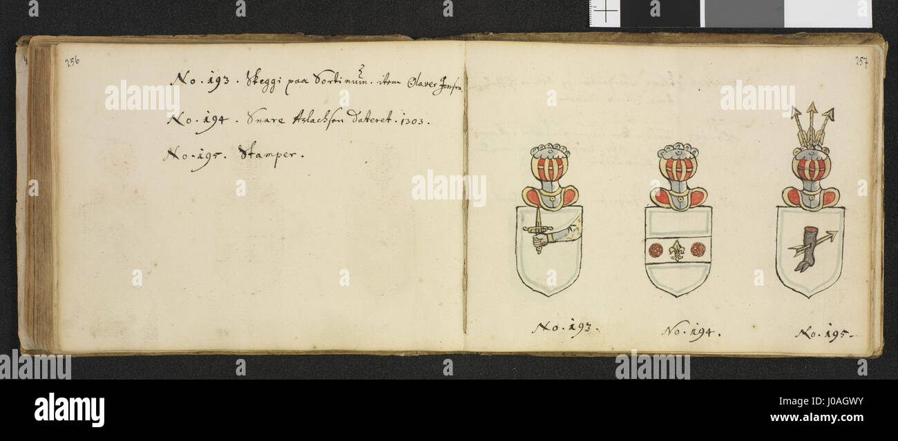 This historical engraving depicts various insignias of distinguished ...