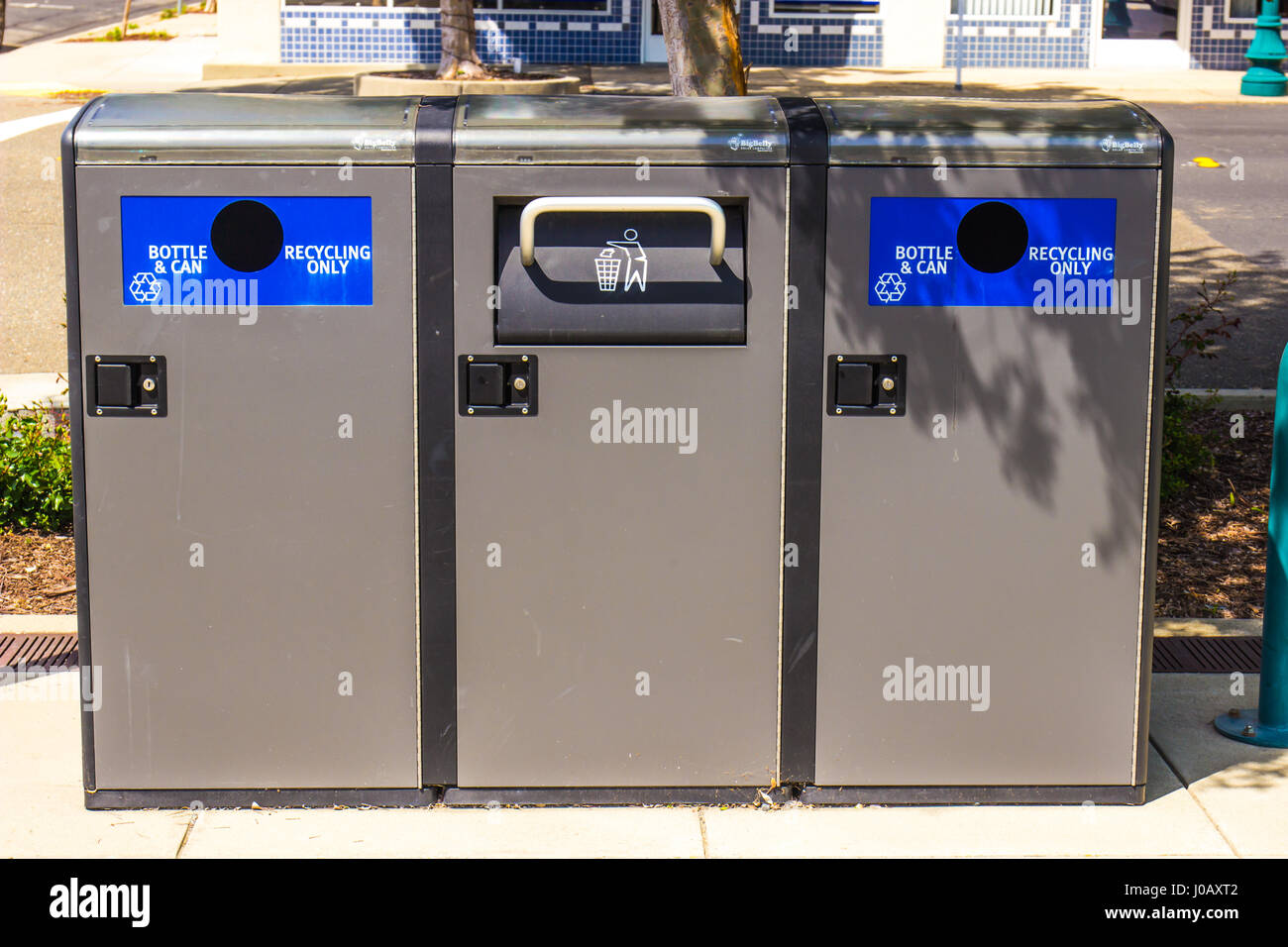 Trash & Recycle Cans On City Street Stock Photo - Alamy