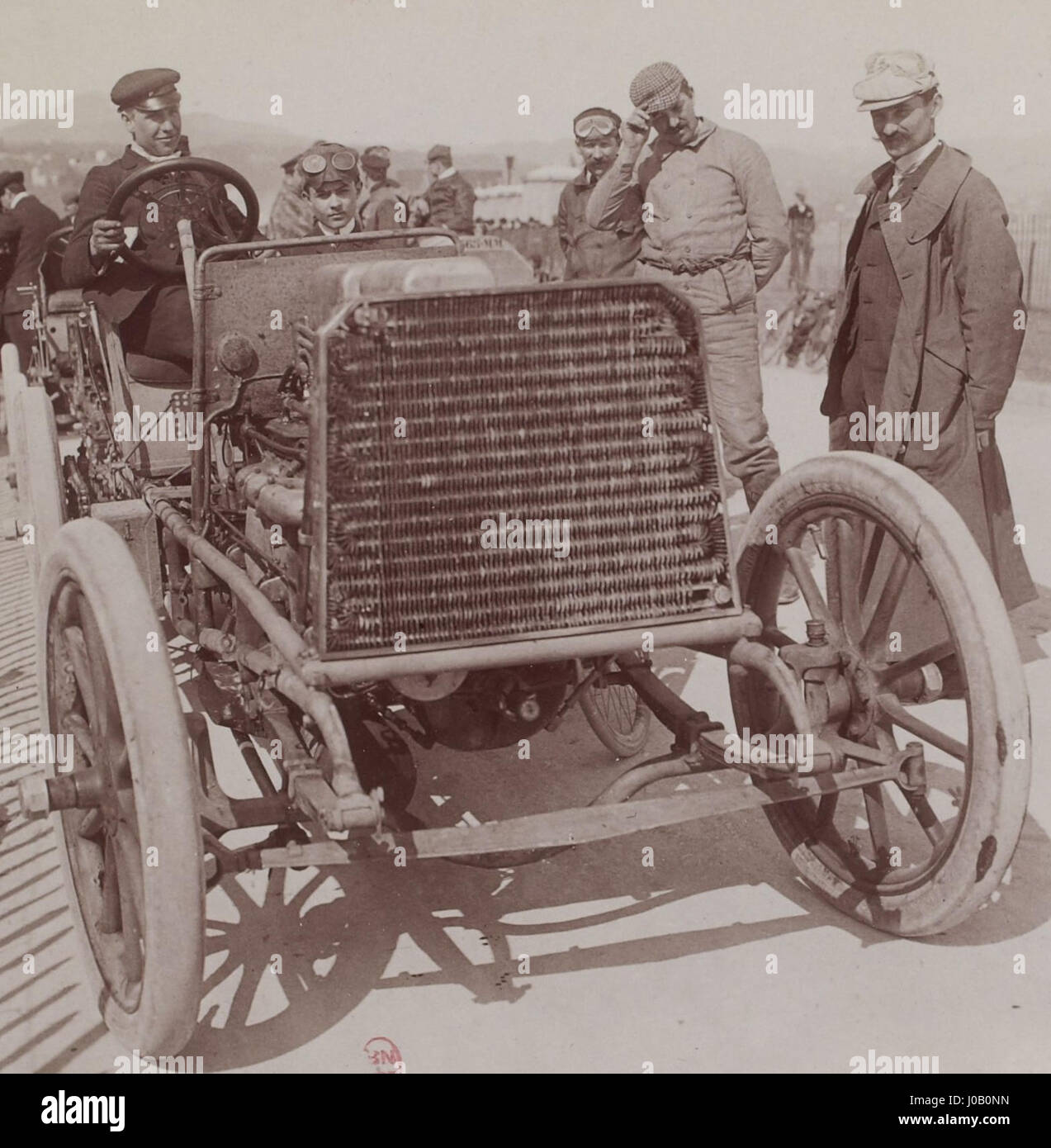 The photograph captures Arthur Duray, a French race car driver, during ...