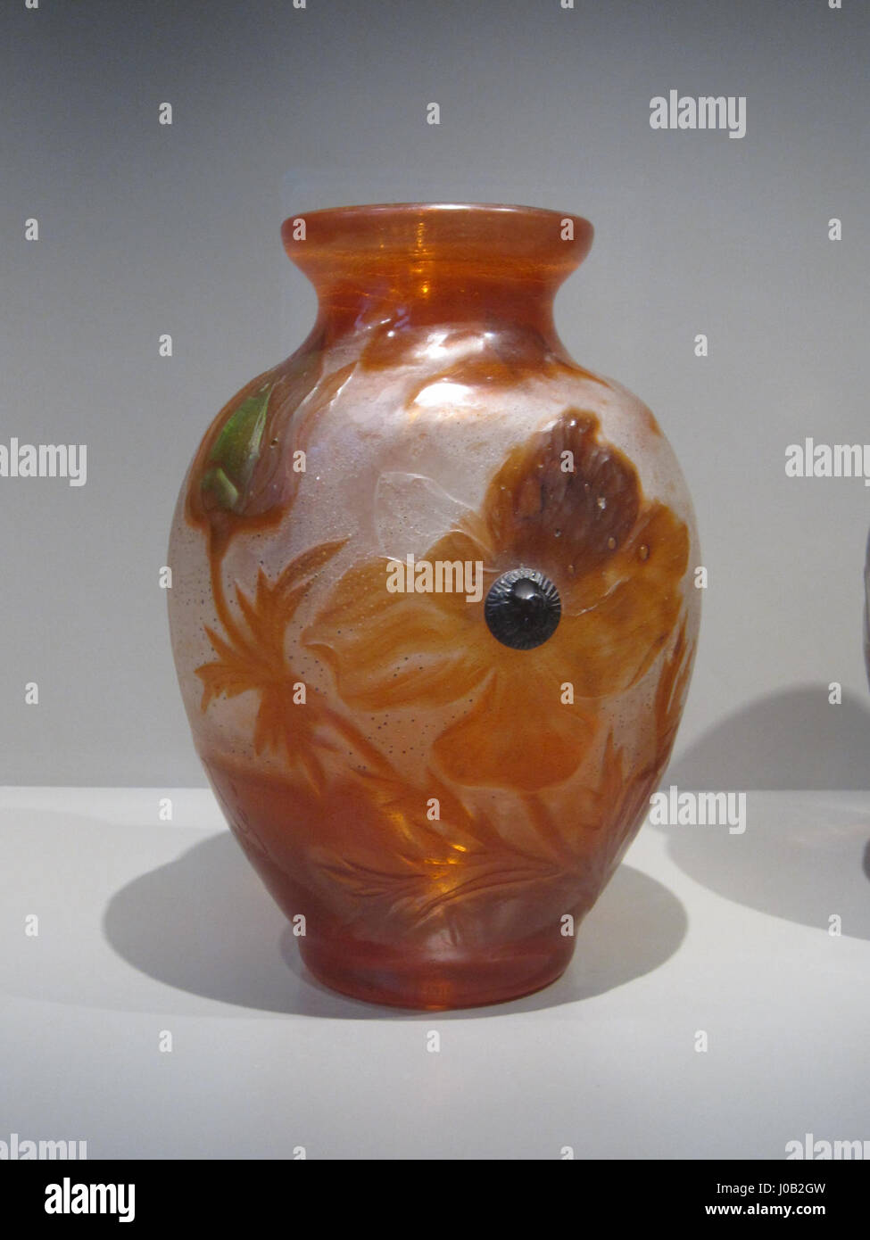 An Art Nouveau vase designed by Emile Gallé, featuring delicate floral ...