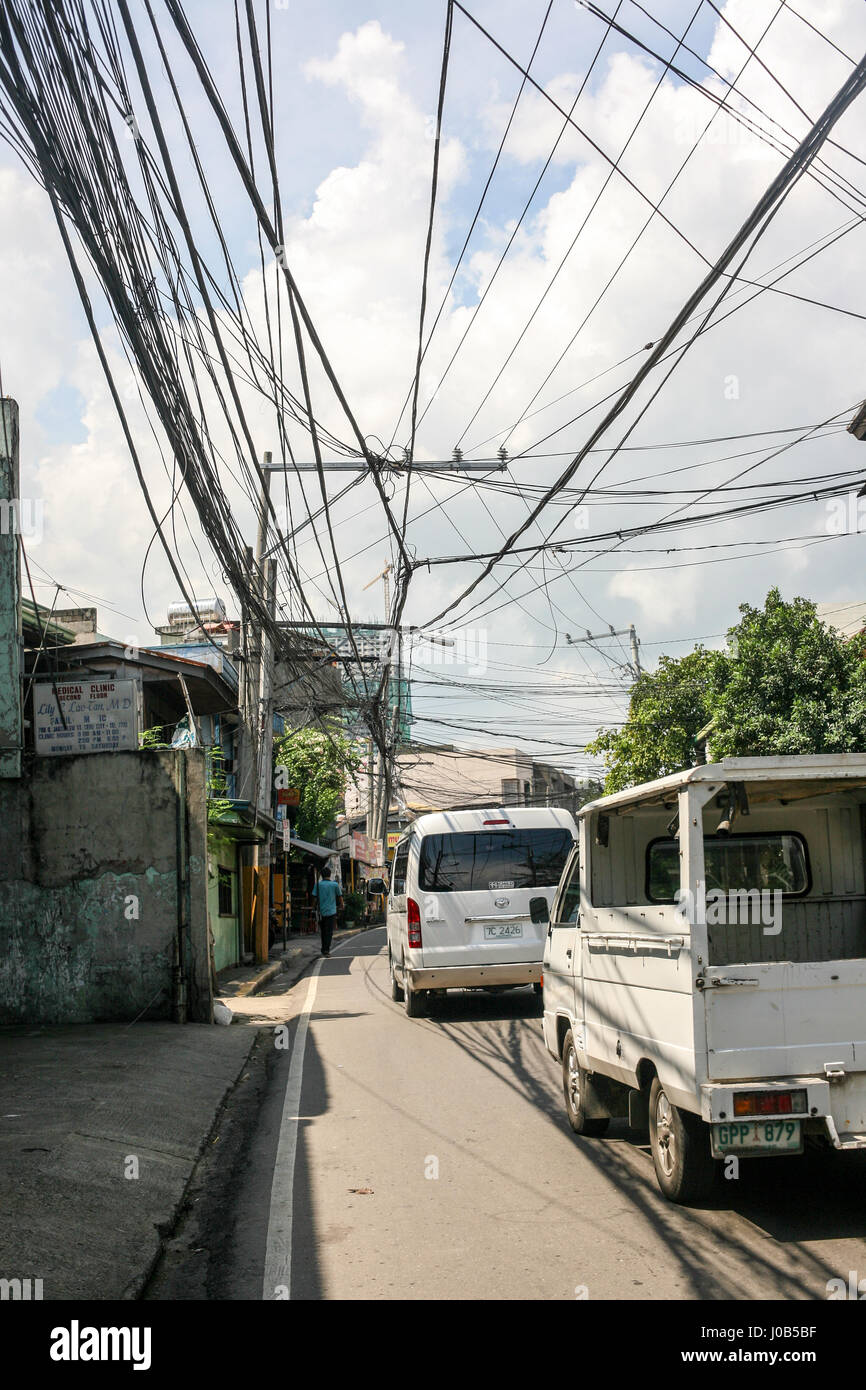 Cebu, Philippines - October 01, 2014. Cable system in front of the blue ...