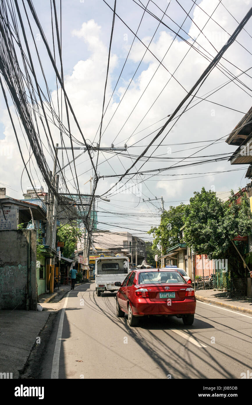 Cebu, Philippines - October 01, 2014. Cable system in front of the blue ...