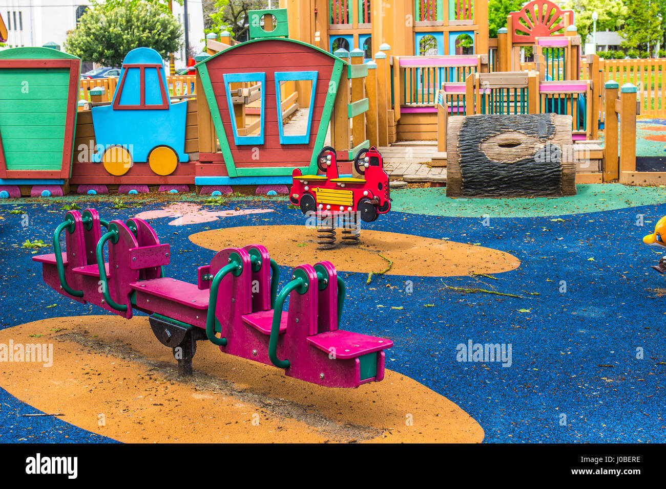 Teeter Totter & Spring Horse At Children's Playground Stock Photo - Alamy